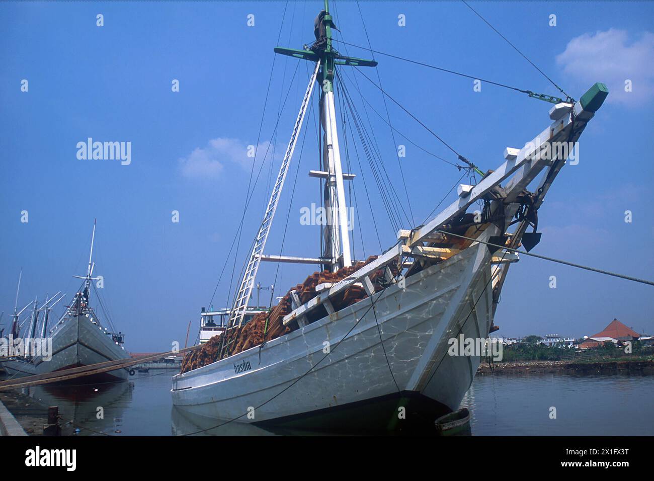 Cargo boat loaded with timber, Harbour, Jakarta, Indonesia Stock Photo ...