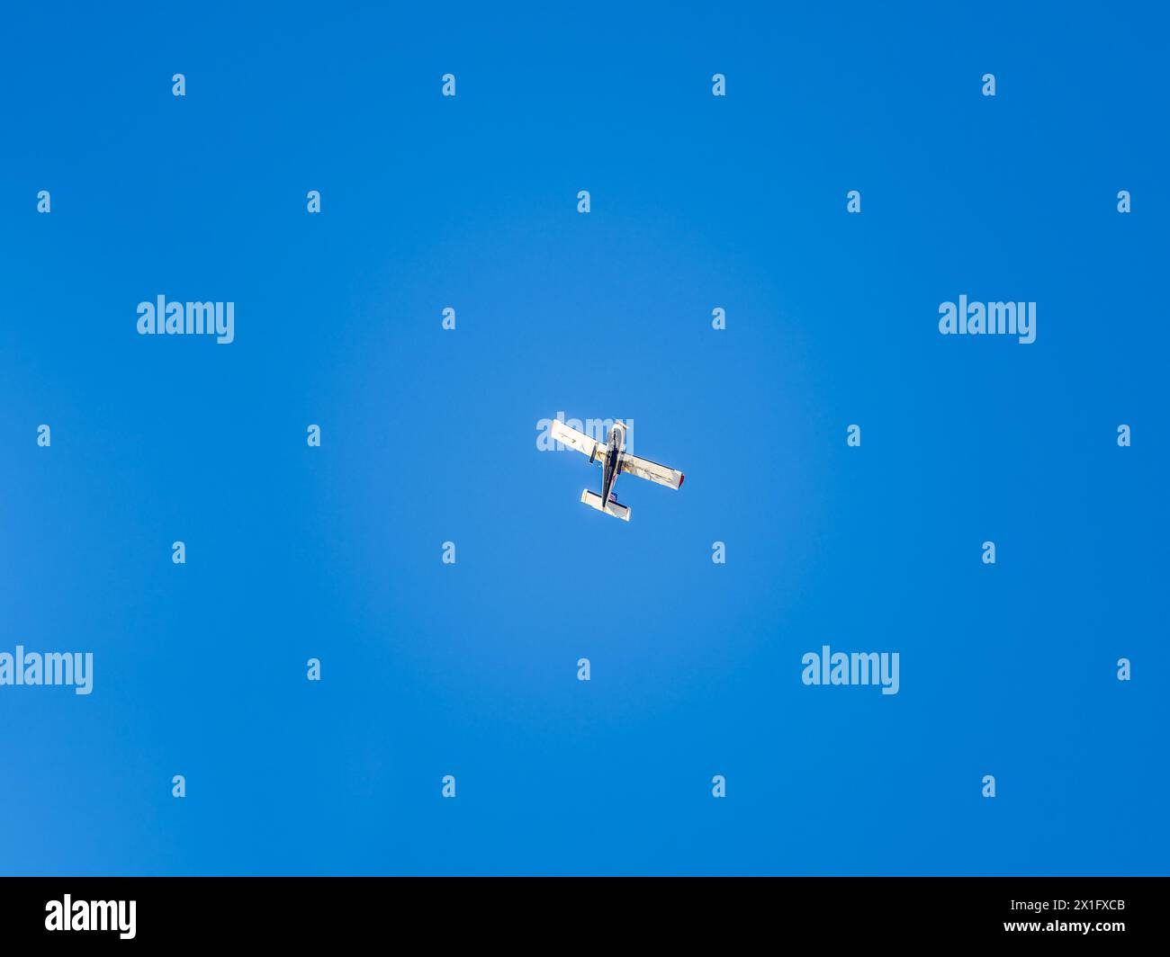 Small ultralight airplane with overhead wing and single propeller ...