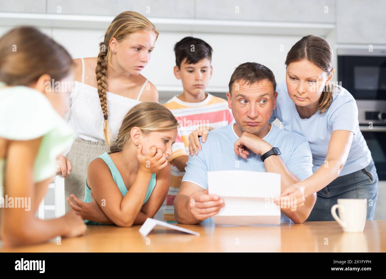 Man family wife children home unhappy hi-res stock photography and ...