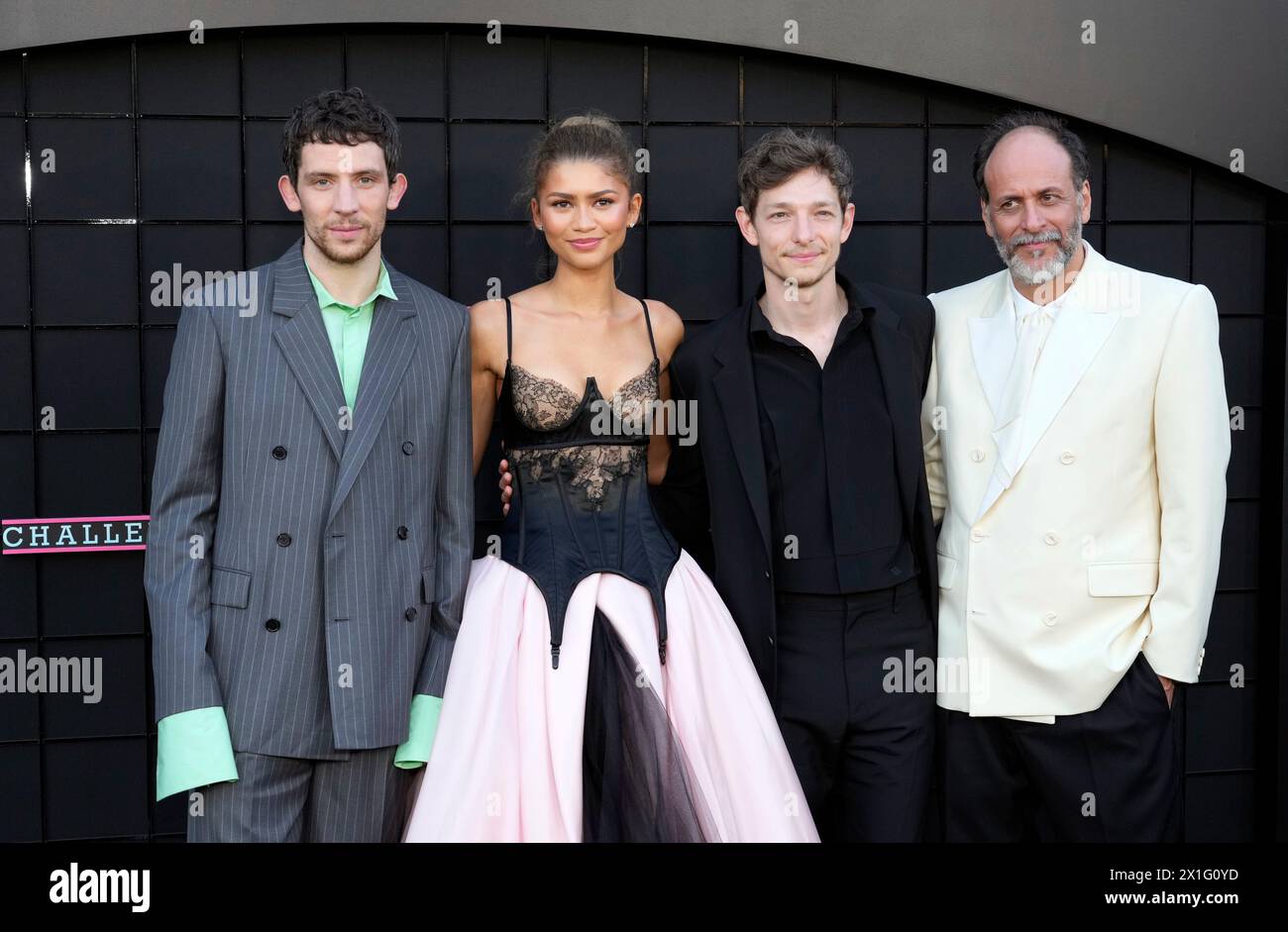 Luca Guadagnino, right, director of "Challengers," poses with cast ...