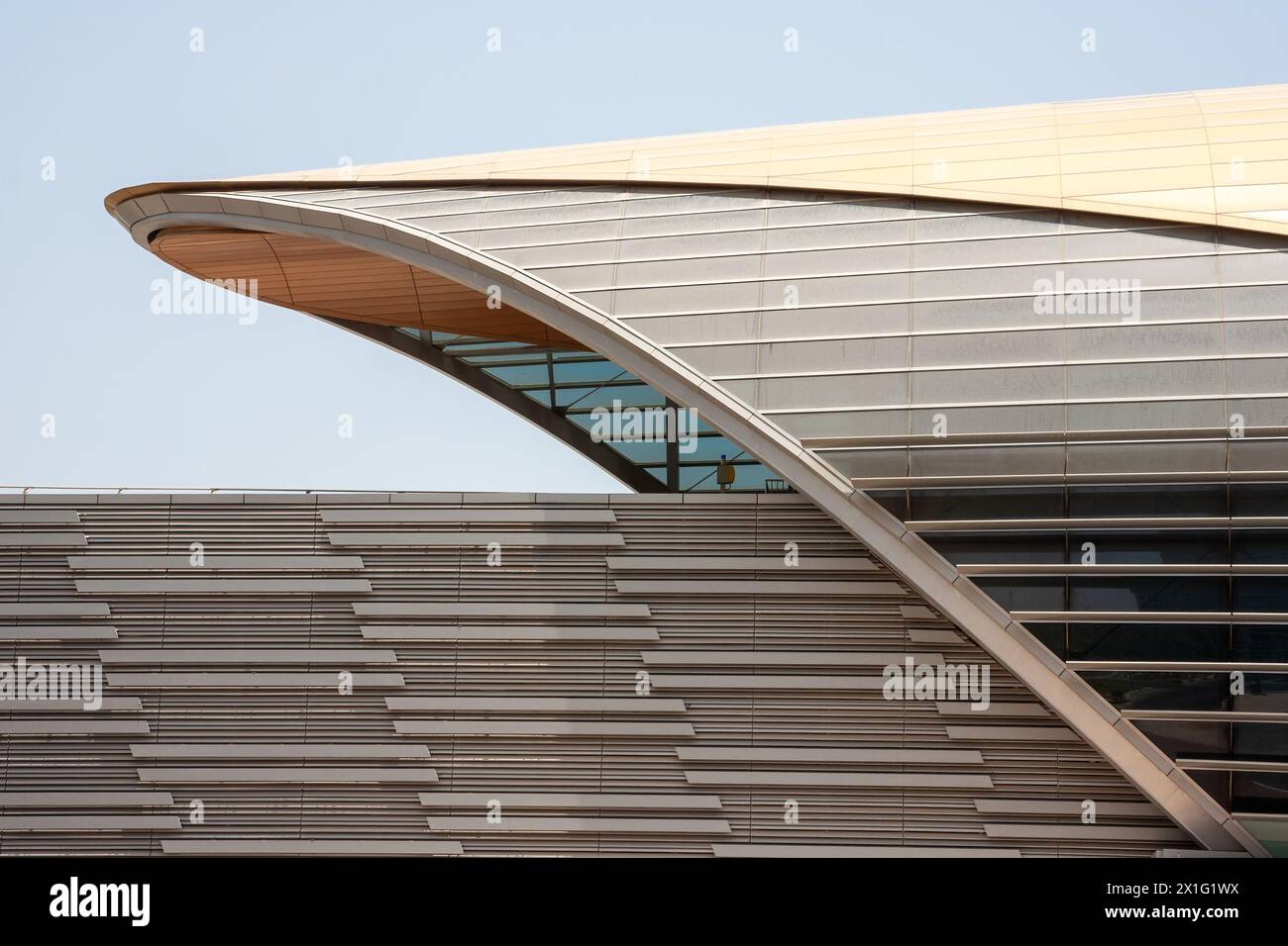 Modern Architecture Displaying Unique Curved Roof Design Against a ...