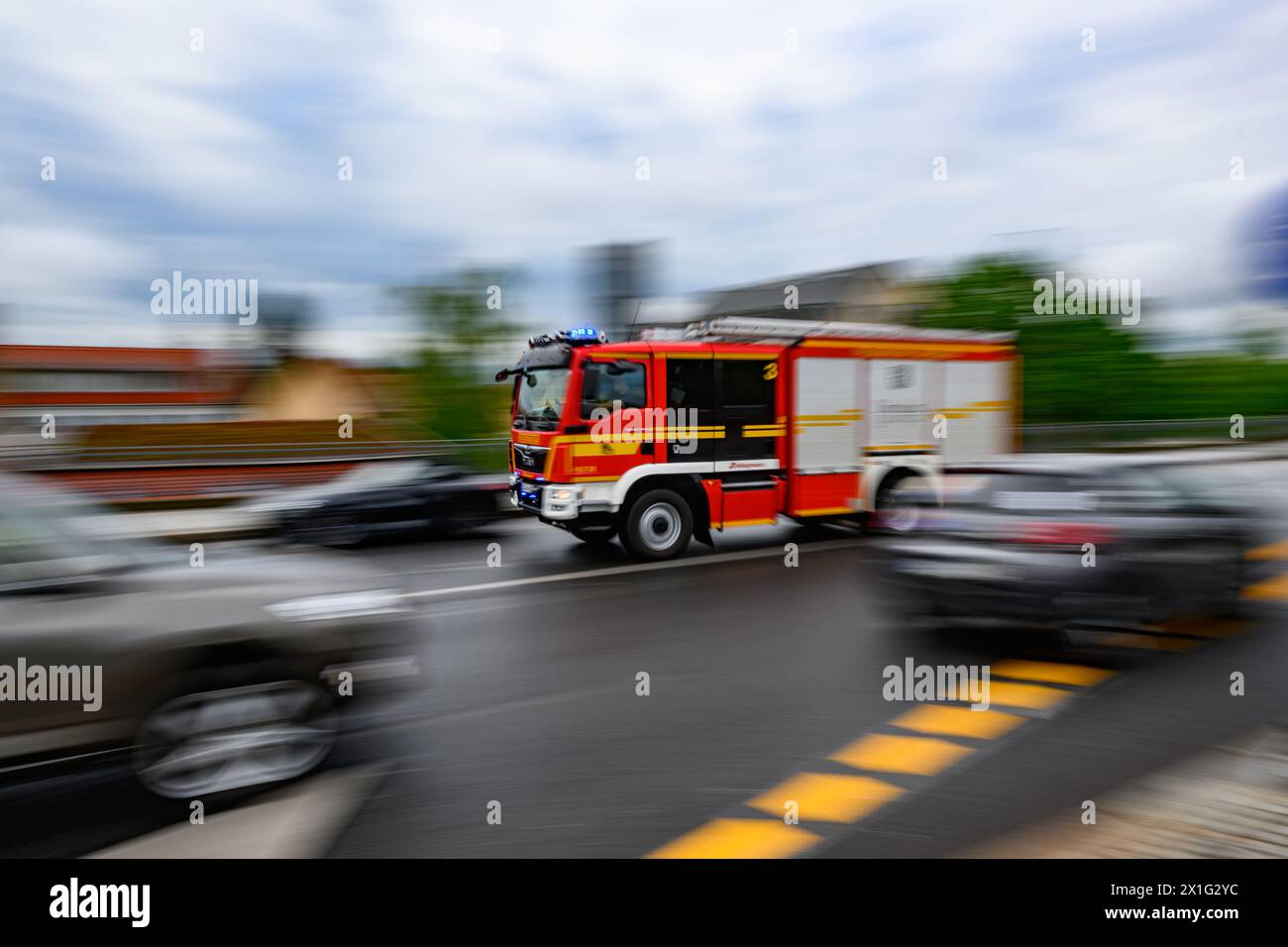 Dresden, Germany. 15th Apr, 2024. A fire engine drives to an operation ...