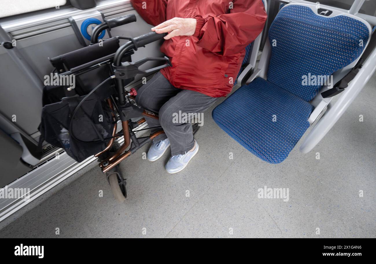 Ludwigsburg, Germany. 09th Apr, 2024. A woman sits on a bus with her ...
