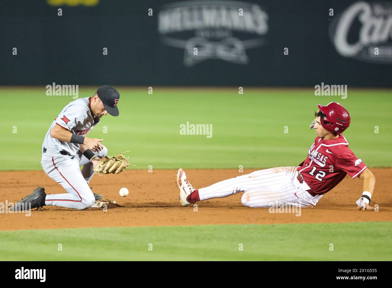 April 16, 2024: Arkansas base runner Jared Sprague-Lott #12 slides into ...