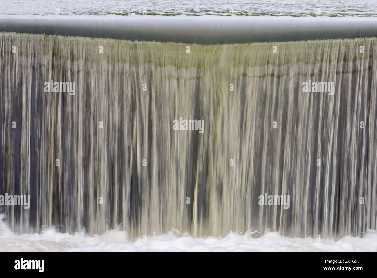 Water flowing over weir, slow or long shutter speed Stock Photo - Alamy