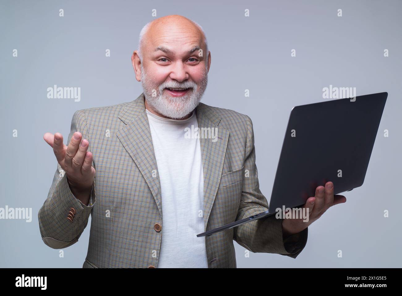 Professor. Old teacher hold laptop computer. 60s businessman using ...