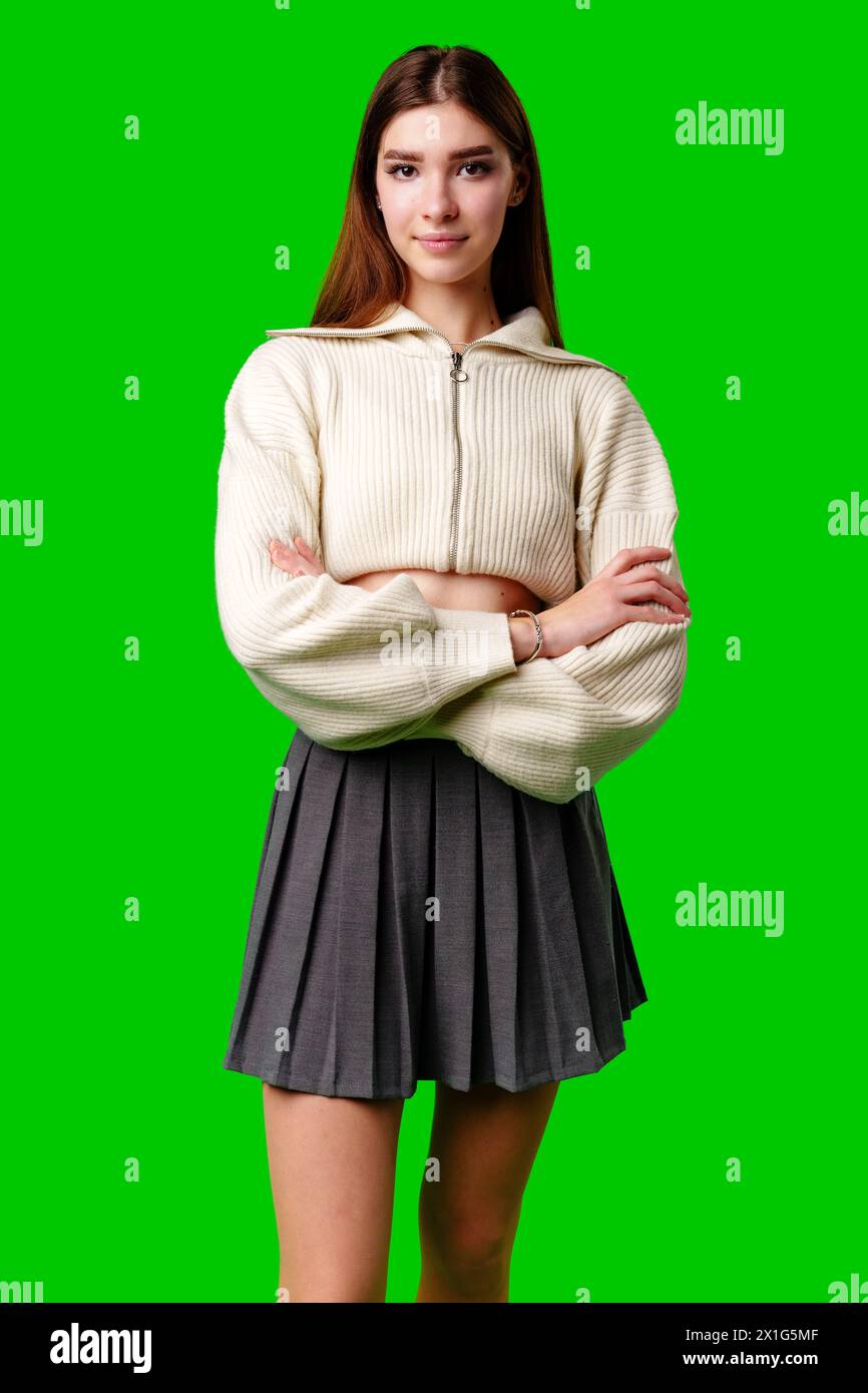 Woman in White Sweater Posing for Picture Stock Photo - Alamy