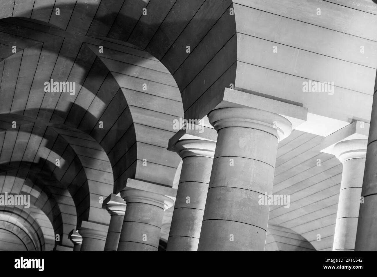 Striking repetition of stone arches and columns in the crypt of the ...