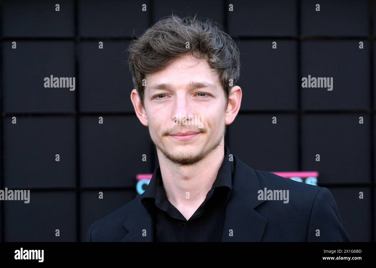 Mike Faist poses at the premiere of the film "Challengers" at the ...