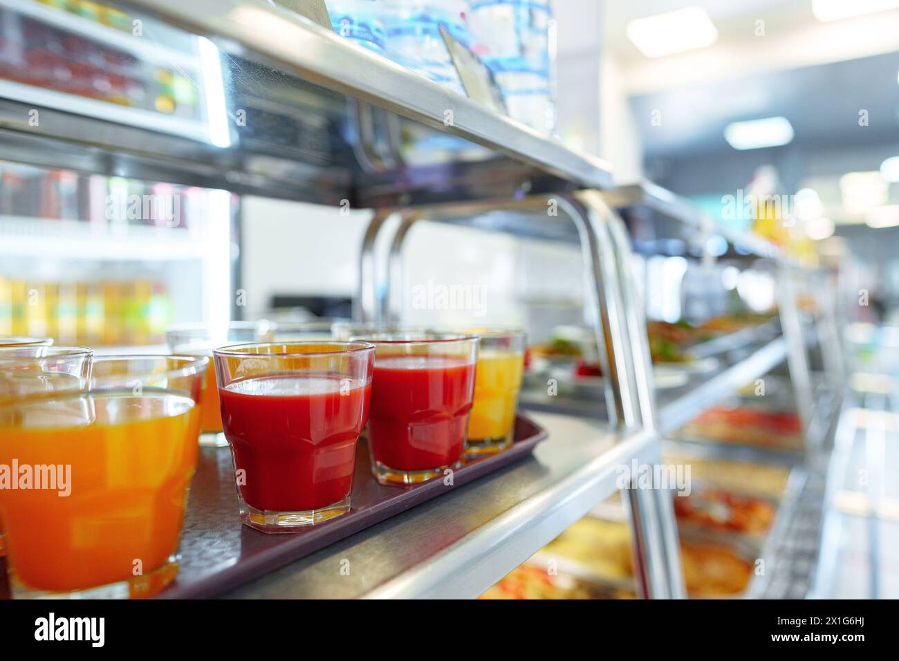 Colorful Array of Fruit Juice Cups on a Serving Cart in a Cafeteria ...