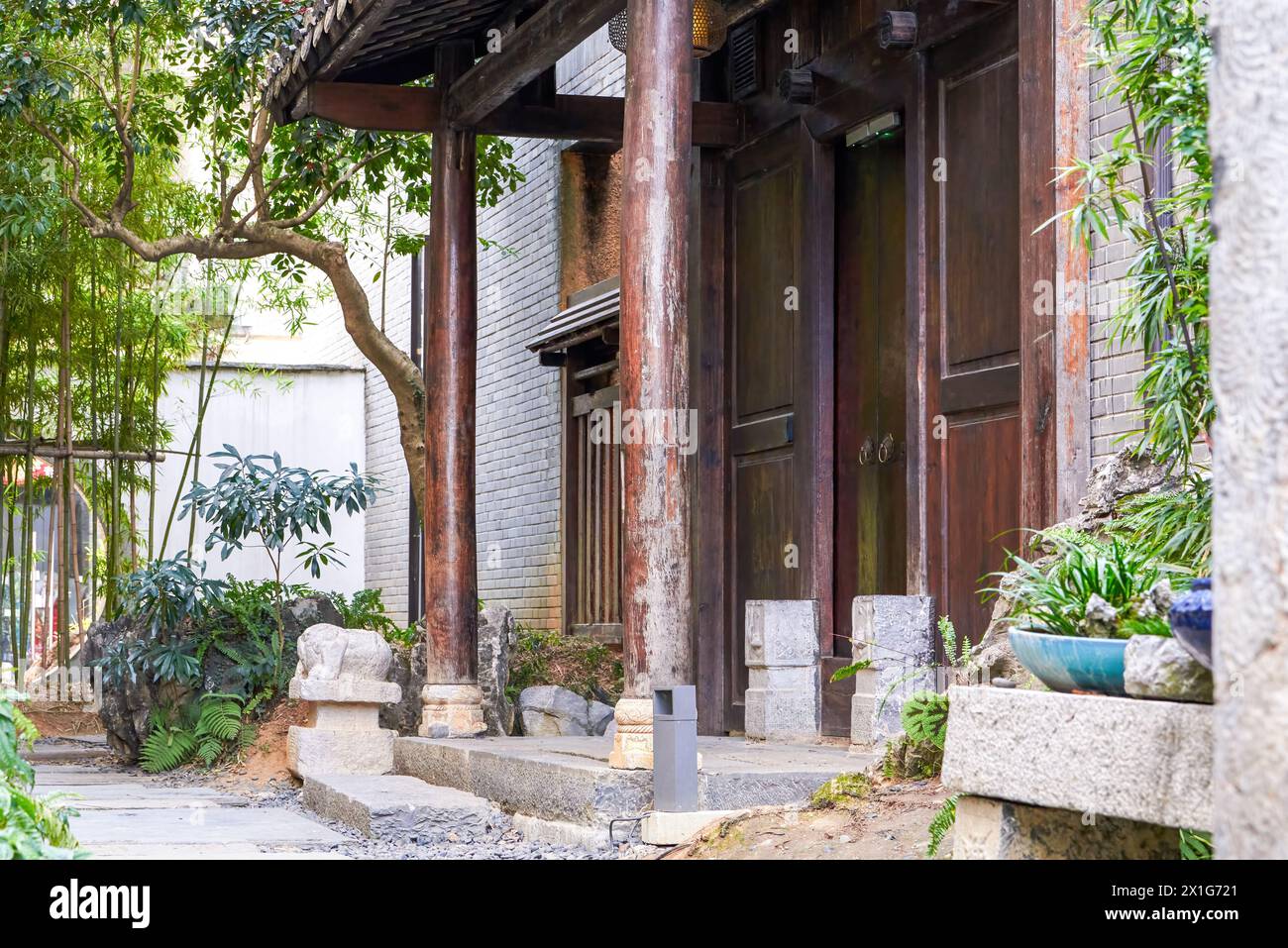 Wooden gate and wooden roof of traditional Chinese building Stock Photo ...