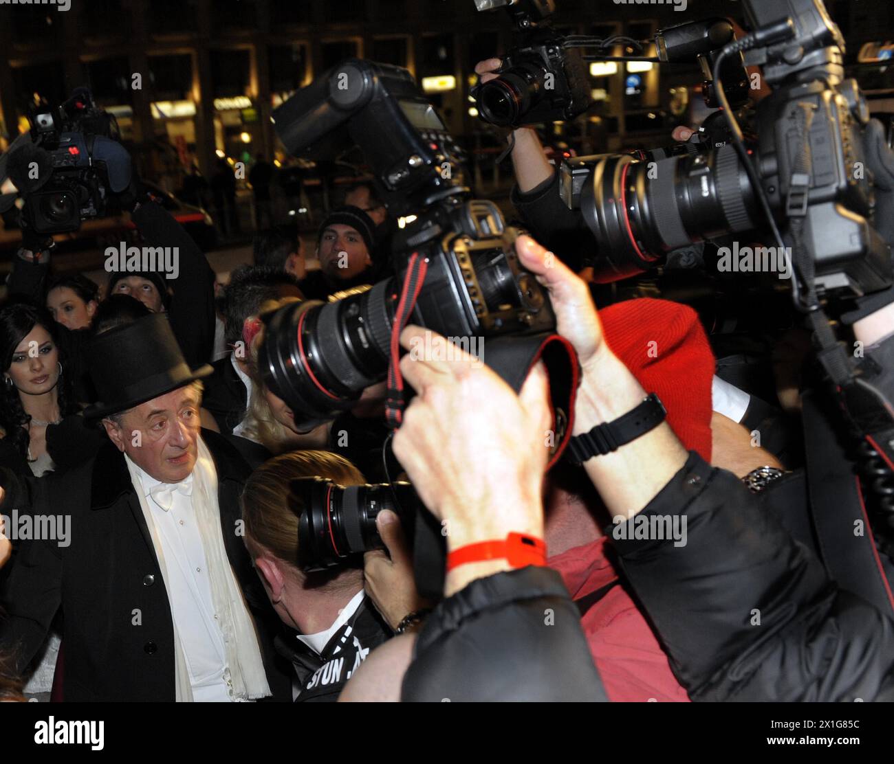 Austrian businessman Richard Lugner (L) arrives for the Opera Ball 2009 ...