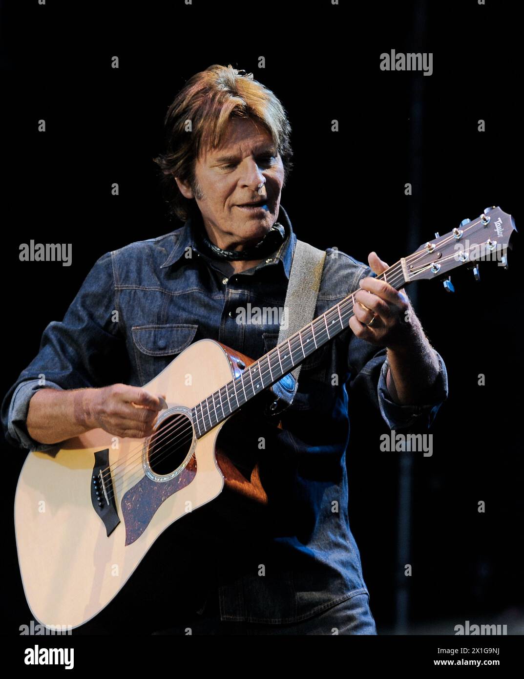 American rock singer, songwriter, and guitarist John Fogerty in concert ...