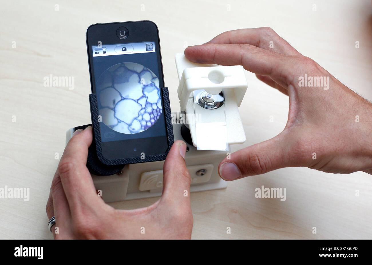 American researchers developed an attachement which turns a cellphone with camera into a high ...