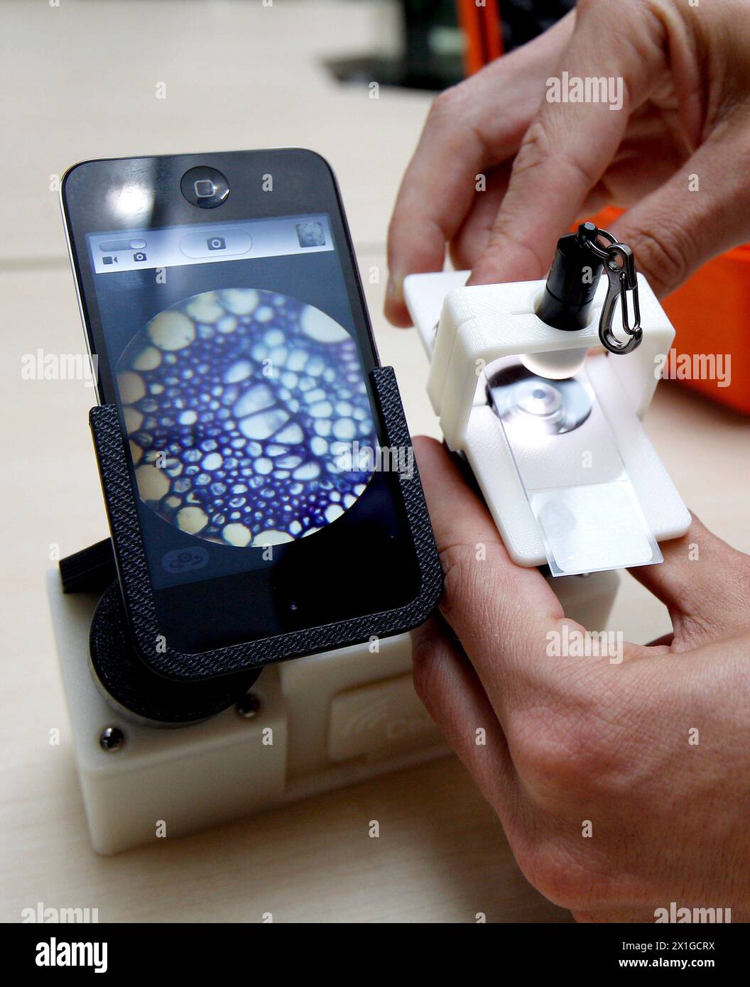 American researchers developed an attachement which turns a cellphone with camera into a high ...