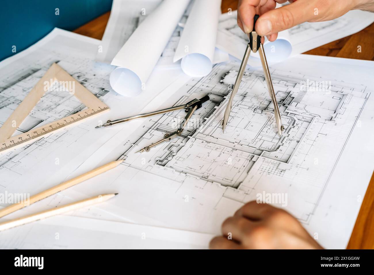 Architectural engineering design plan drawing on the table. Architect's ...