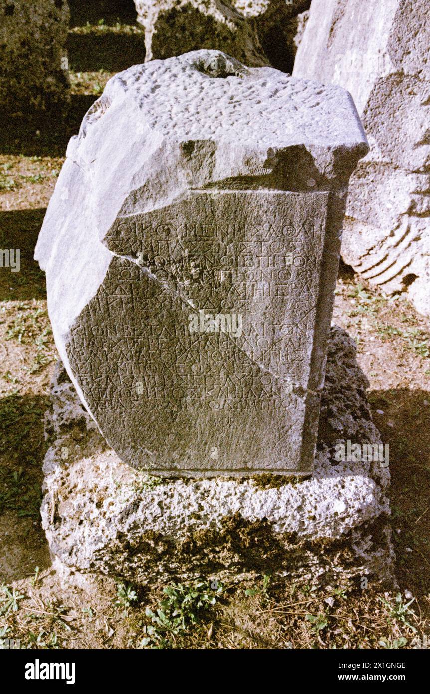 Stone with Ancient Greek inscriptions, Olympia, Greece Stock Photo - Alamy