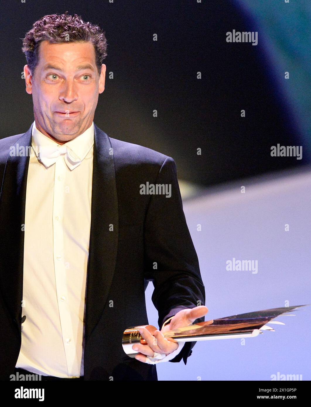 Austrian actor Gregor Bloeb reacts after winning the Best Actor Nestroy ...