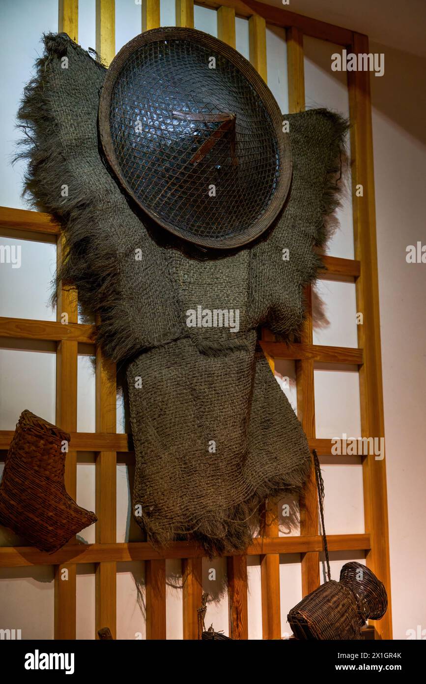 Close-up of a traditional straw raincoat in a Chinese village Stock ...
