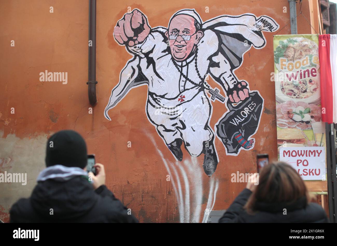 A caricature at a wall in Rome, Italy, shows Pope Francis as a ...
