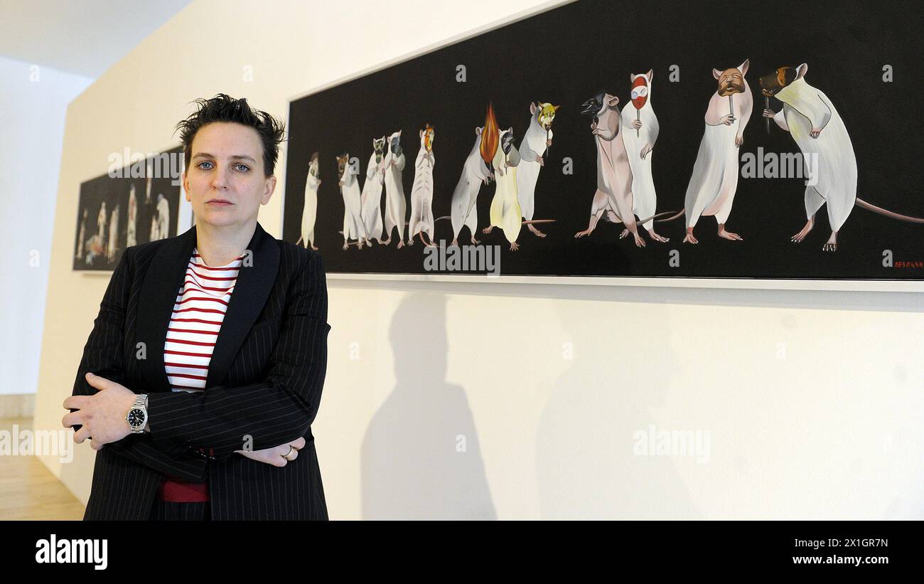 Austrian artist Deborah Sengl poses at her exhibition 'Die letzten Tage ...