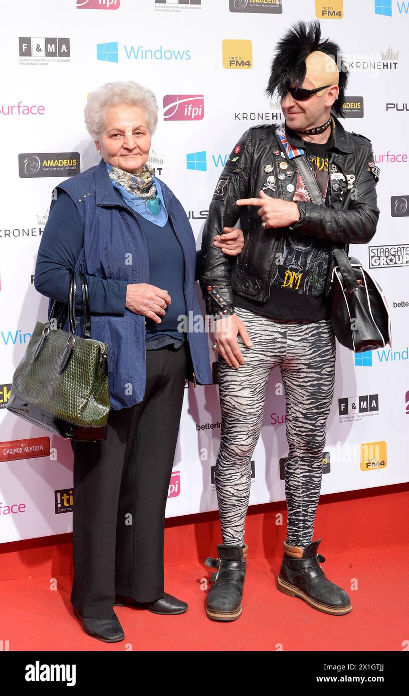 Austrian comedian Alf Poier poses for photographers during a photocall ...