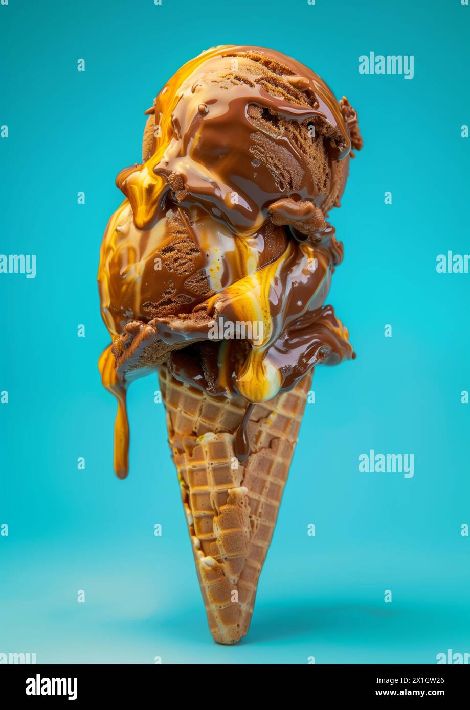 Two scoops of Chocolate ice cream on top ice cream cone blue background ...