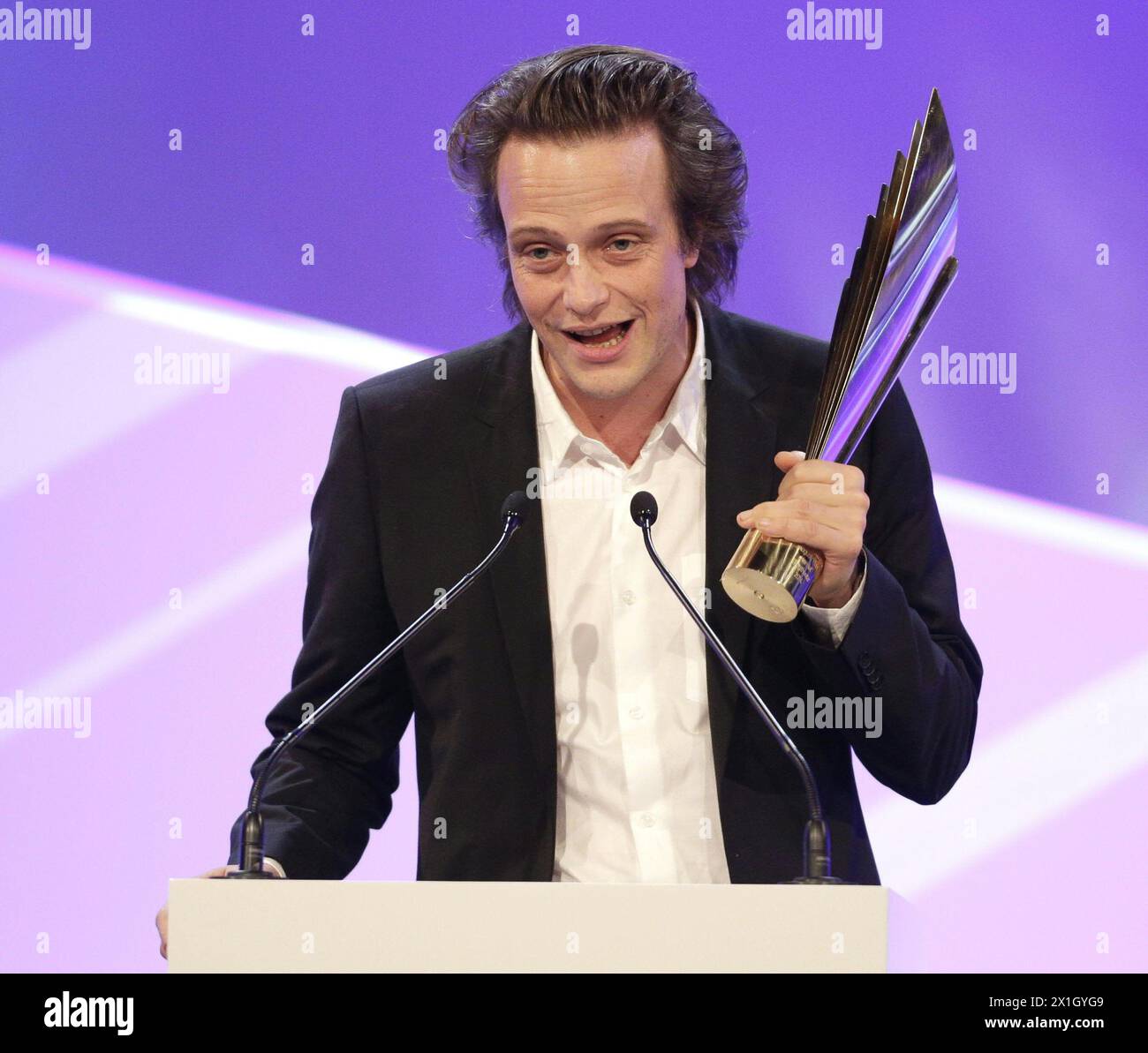 German actor August Diehl receiving Best Actor award at the Nestroy ...