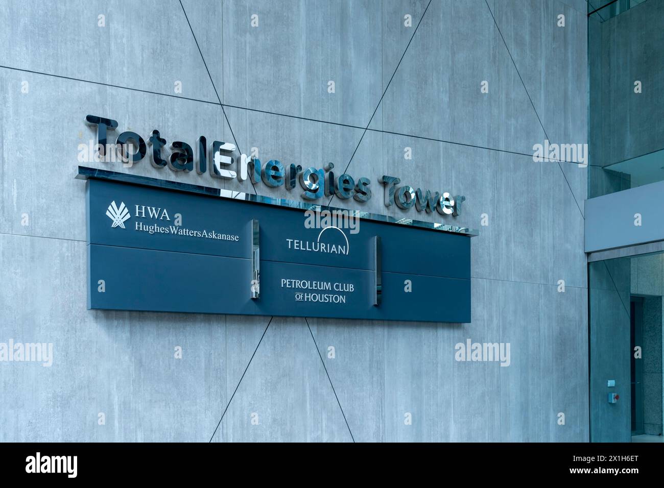 TotalEnergies Tower directory sign with company signs (HWA, Tellurian ...