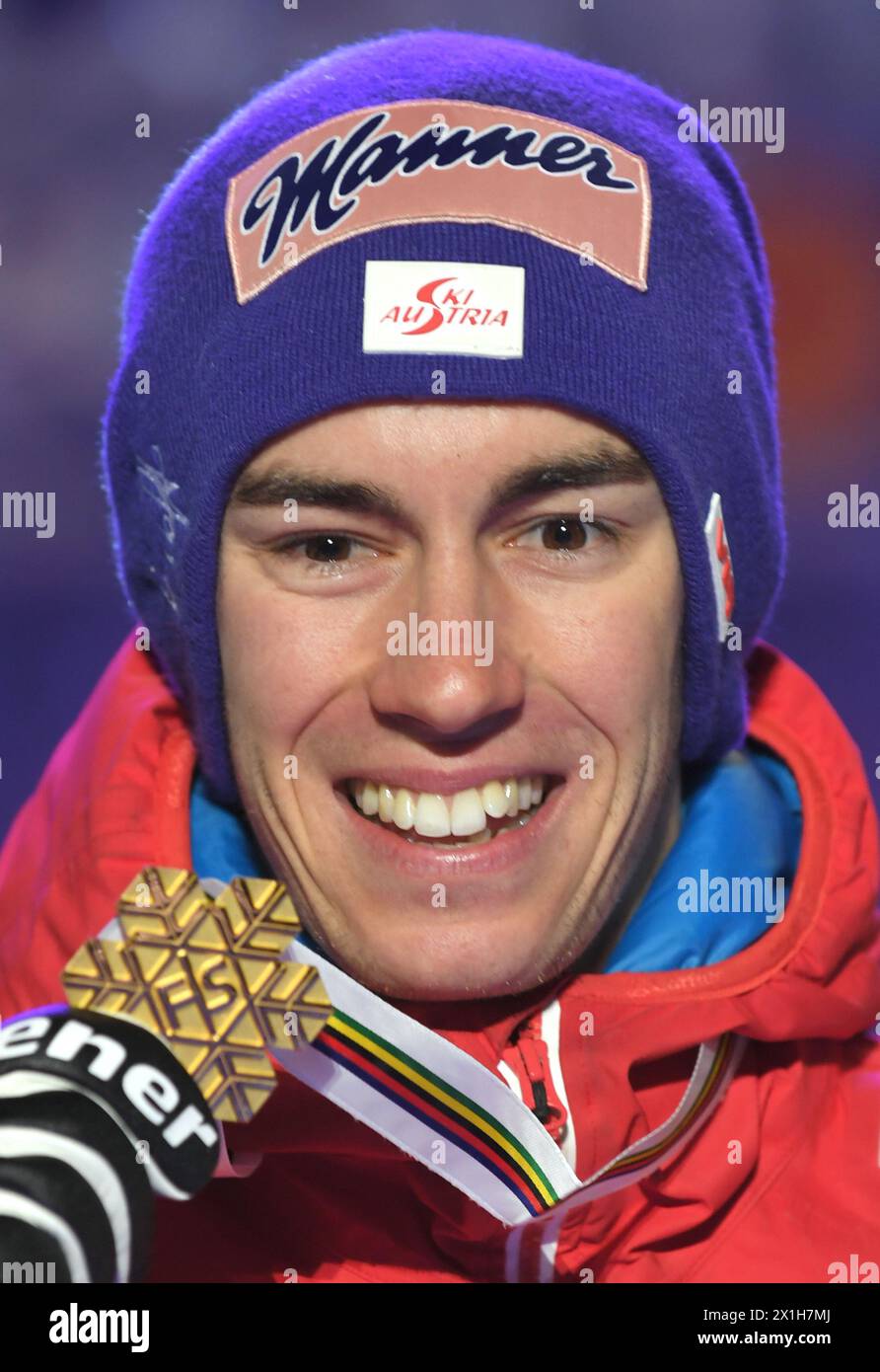 Gold medal winner Stefan Kraft of Austria celebrate his medals at ...