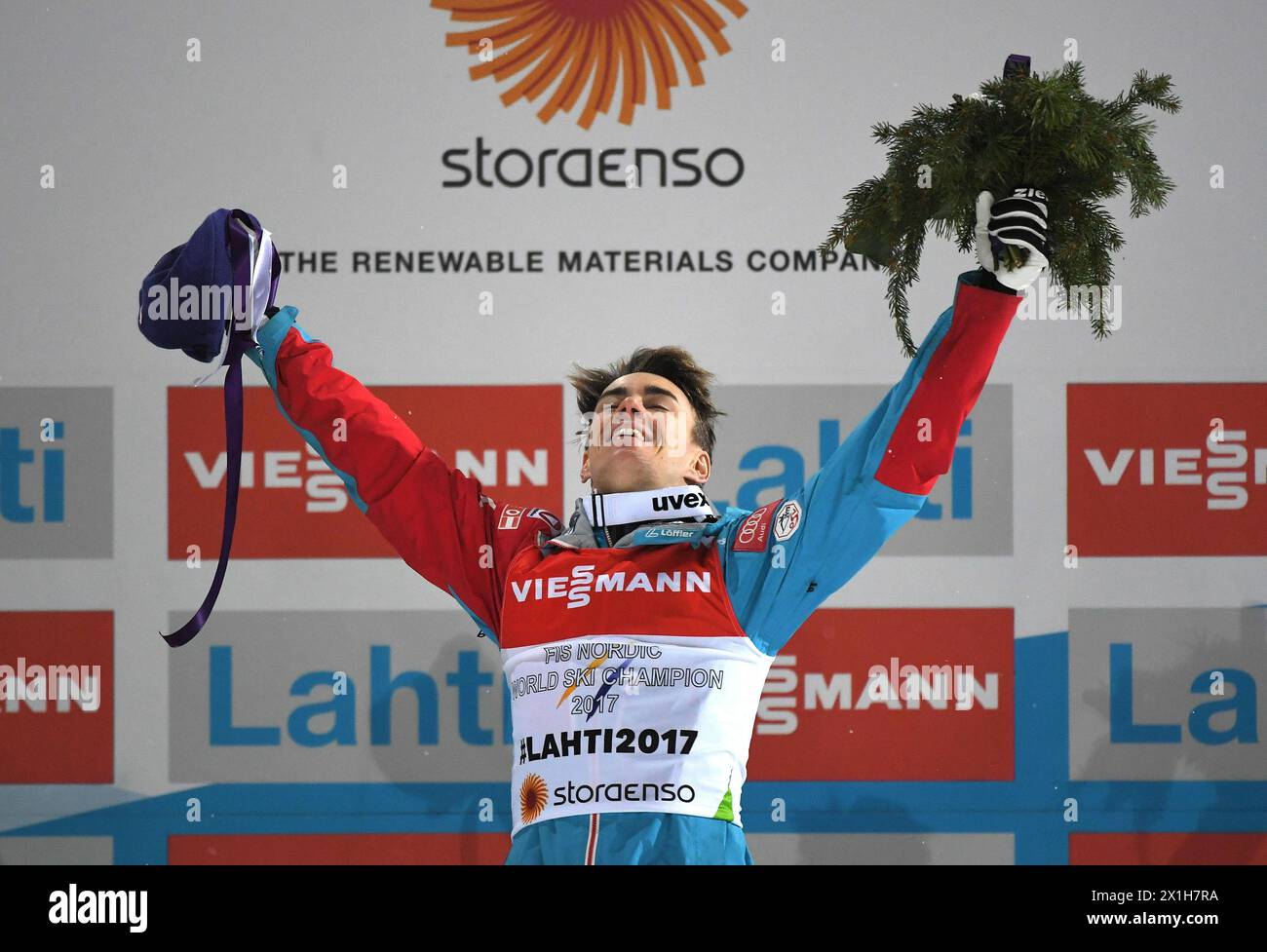 Austrian Stefan Kraft celebrates after his last jump of the men large ...