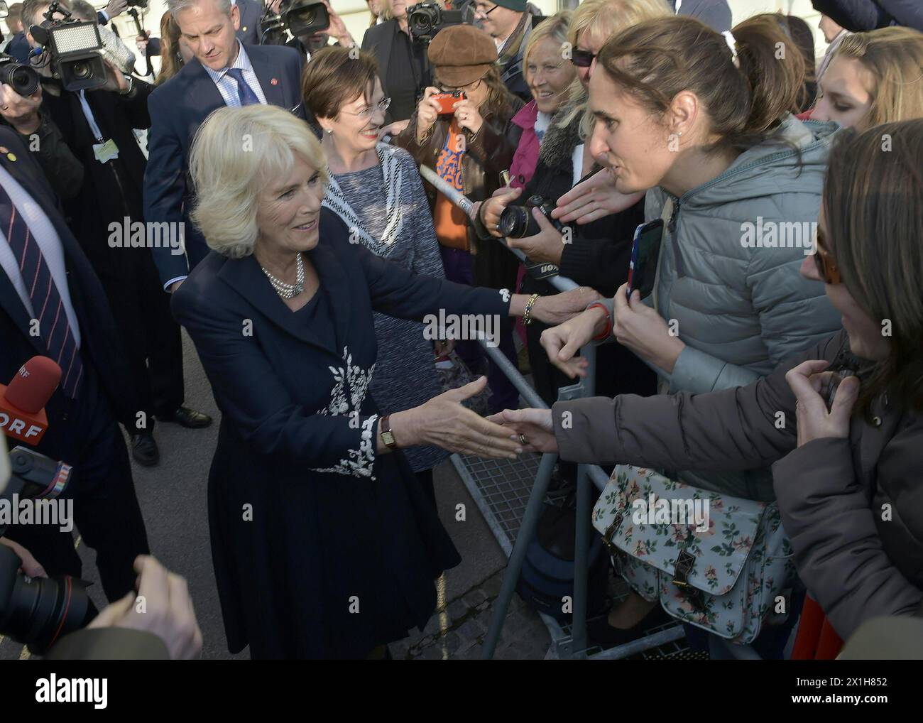 Camilla, Duchess of Cornwall (R) and Doris Schmidauer (L) greet ...