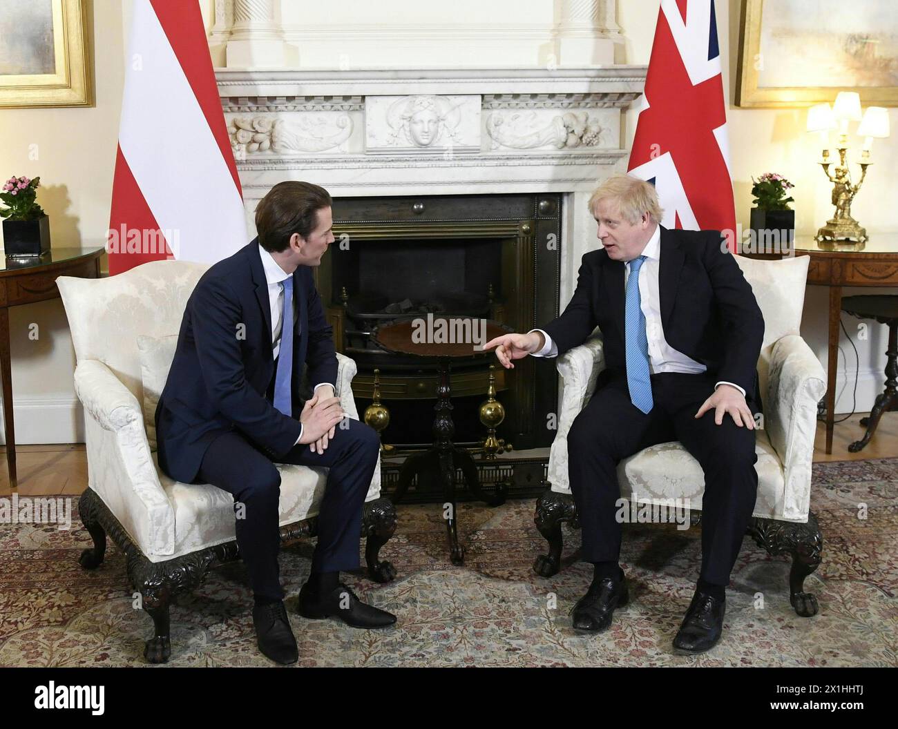 Britain's Prime Minister Boris Johnson (R) talks with Austria's ...
