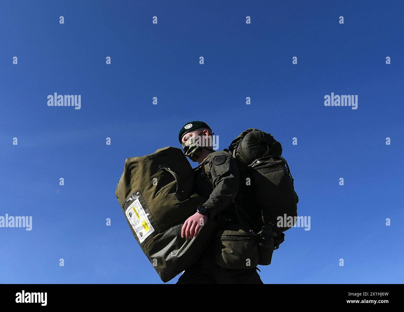 Austrian armed forces soldiers arrive wearing face masks to the RAAB ...