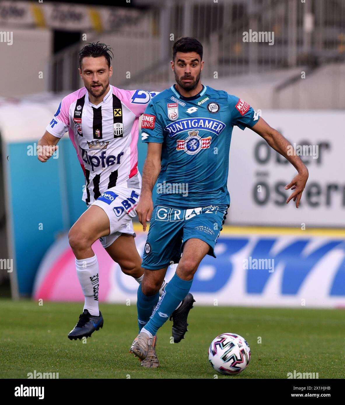 (L-R) James Holland (LASK) and Kiril Despodov (SK Puntigamer Sturm Graz ...