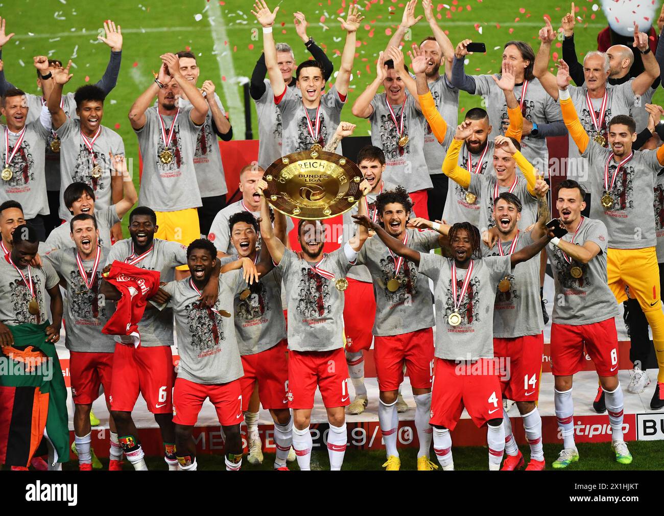 FC Red Bull Salzburg's team players celebrate with the trophy after ...