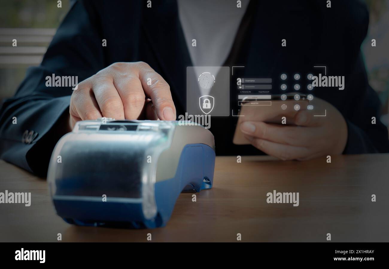 Businessman using EDC (Electronic Data Capture) and login for payment ...