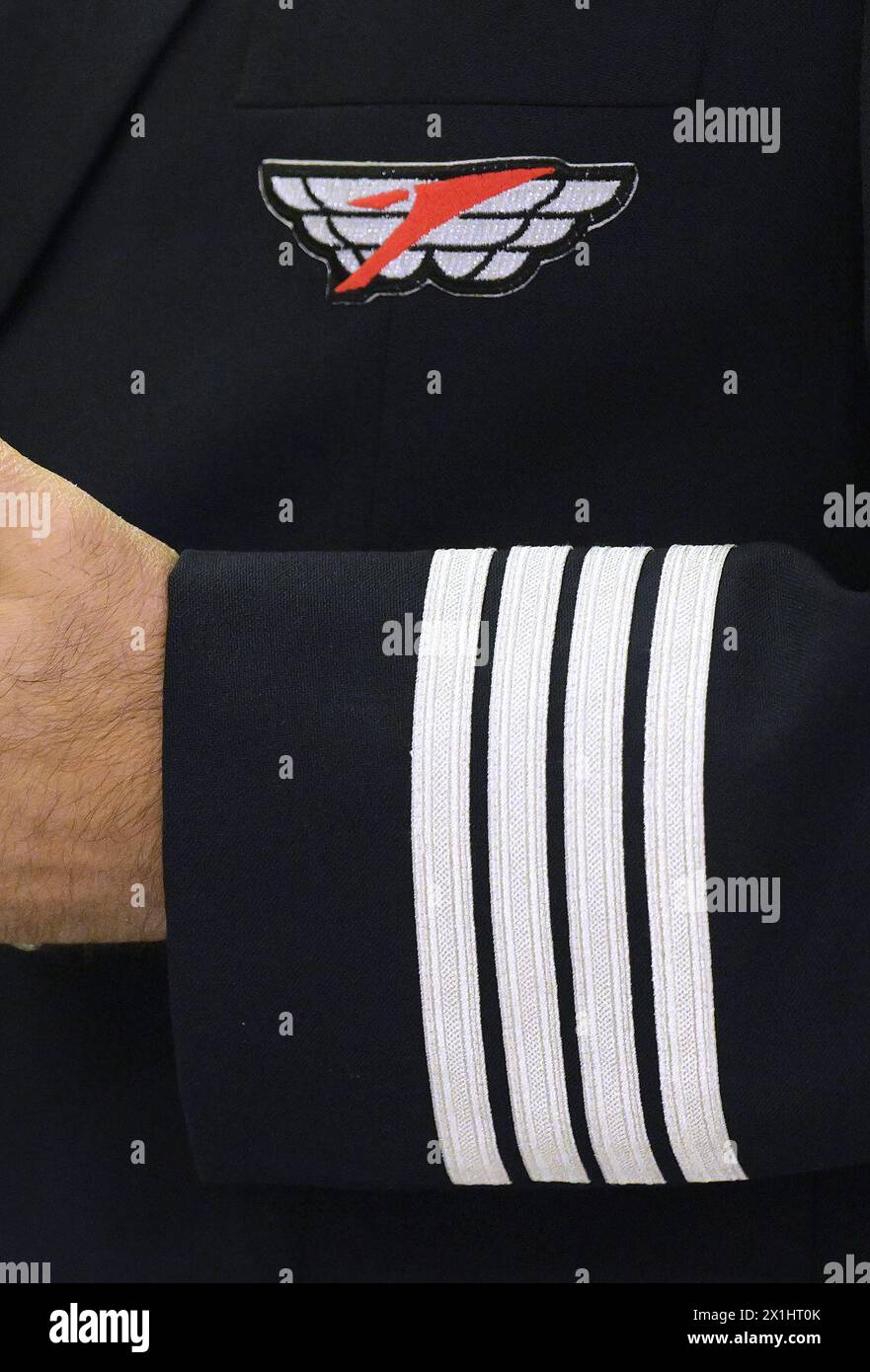 An AUA emblem on a pilot's uniform - 20230328 PD1626 - Rechteinfo ...