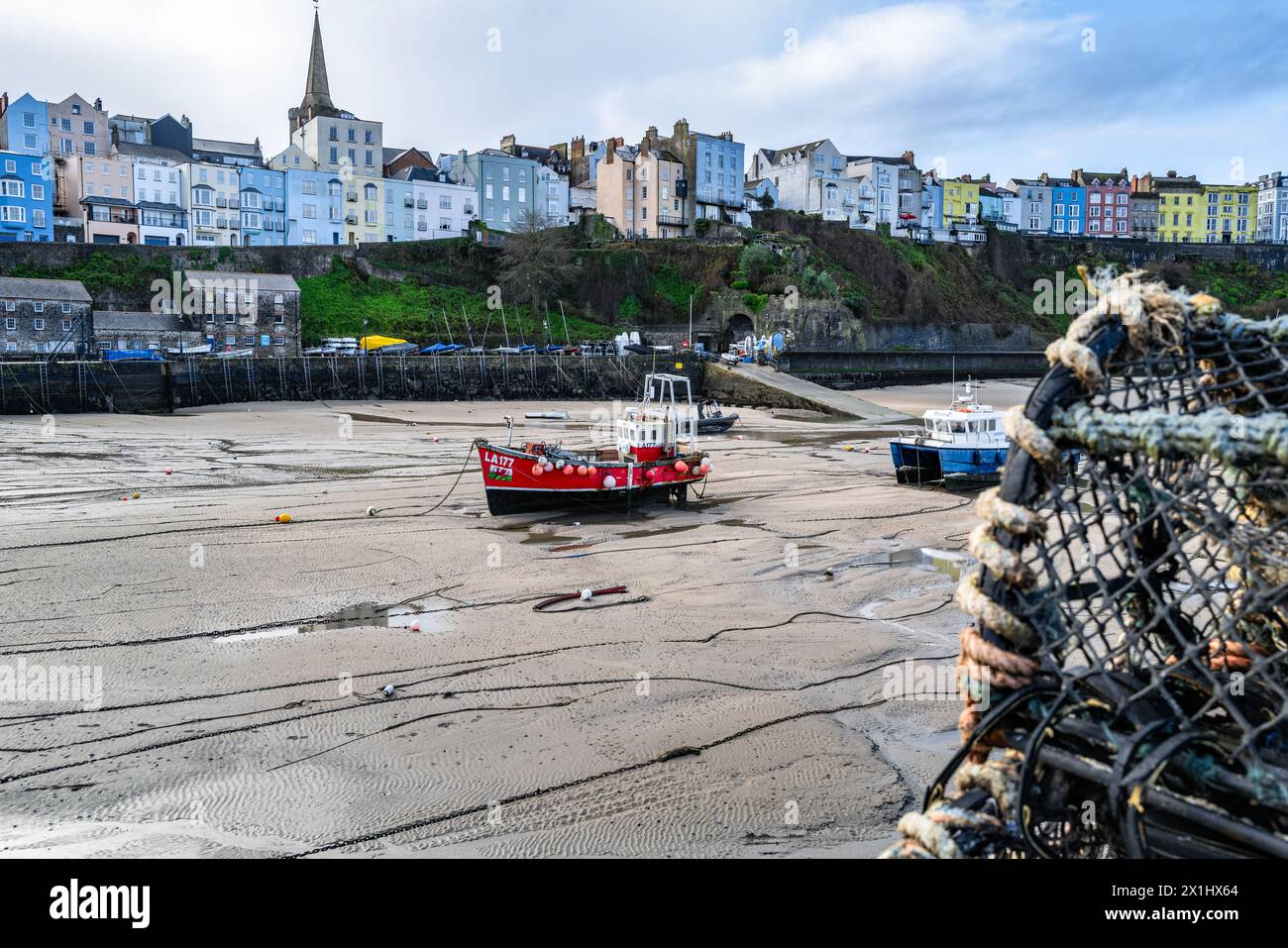 Tenby is a harbour town and resort in southwest Wales. It’s known for ...