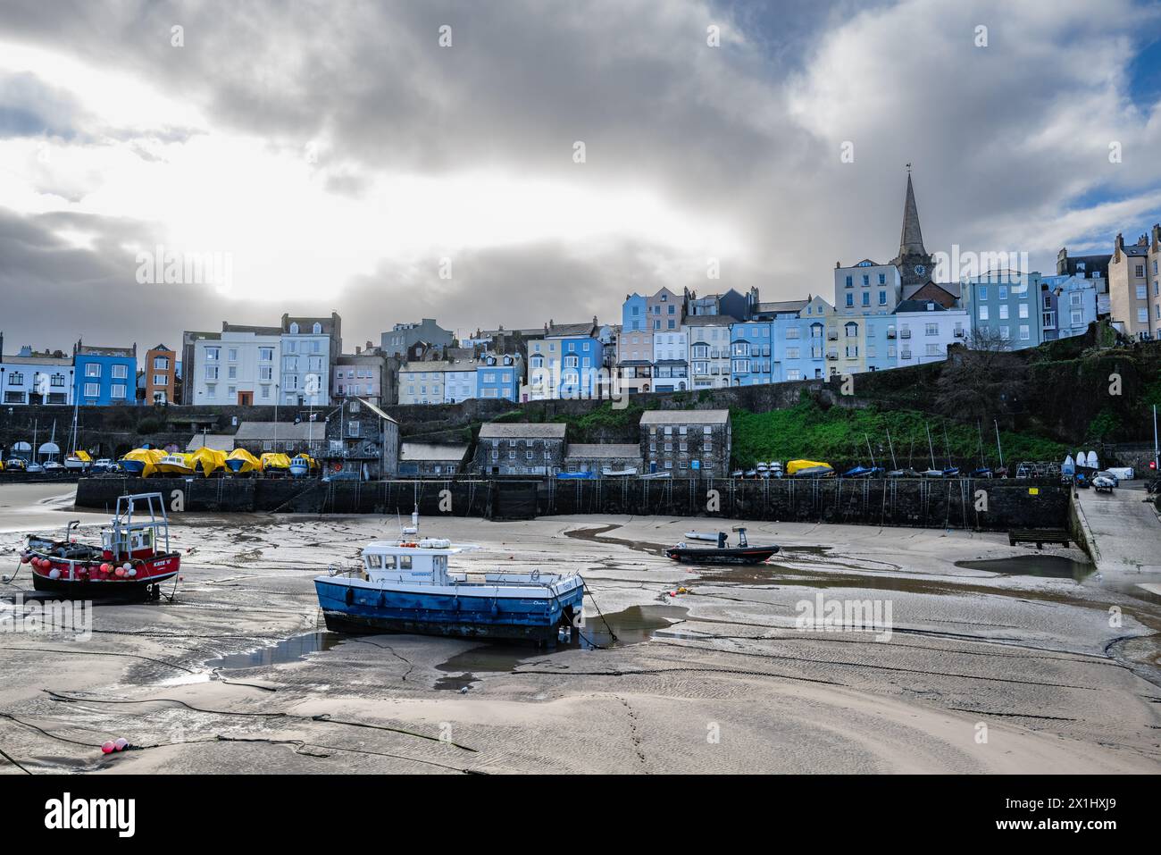 Tenby is a harbour town and resort in southwest Wales. It’s known for ...