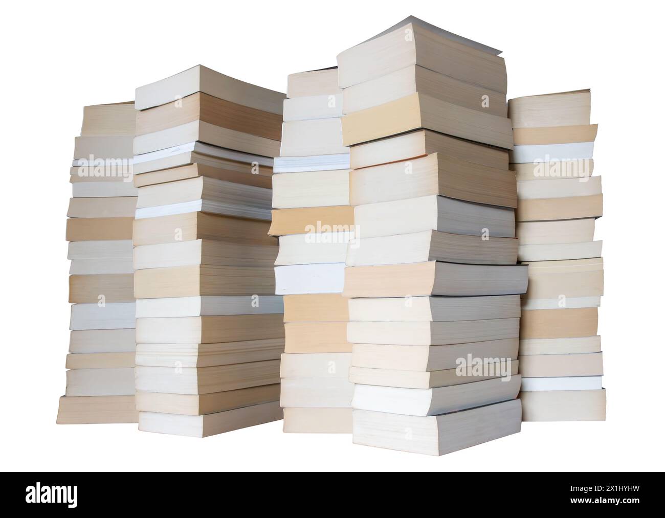 Wall of books, many stacks of books isolated on white background with ...