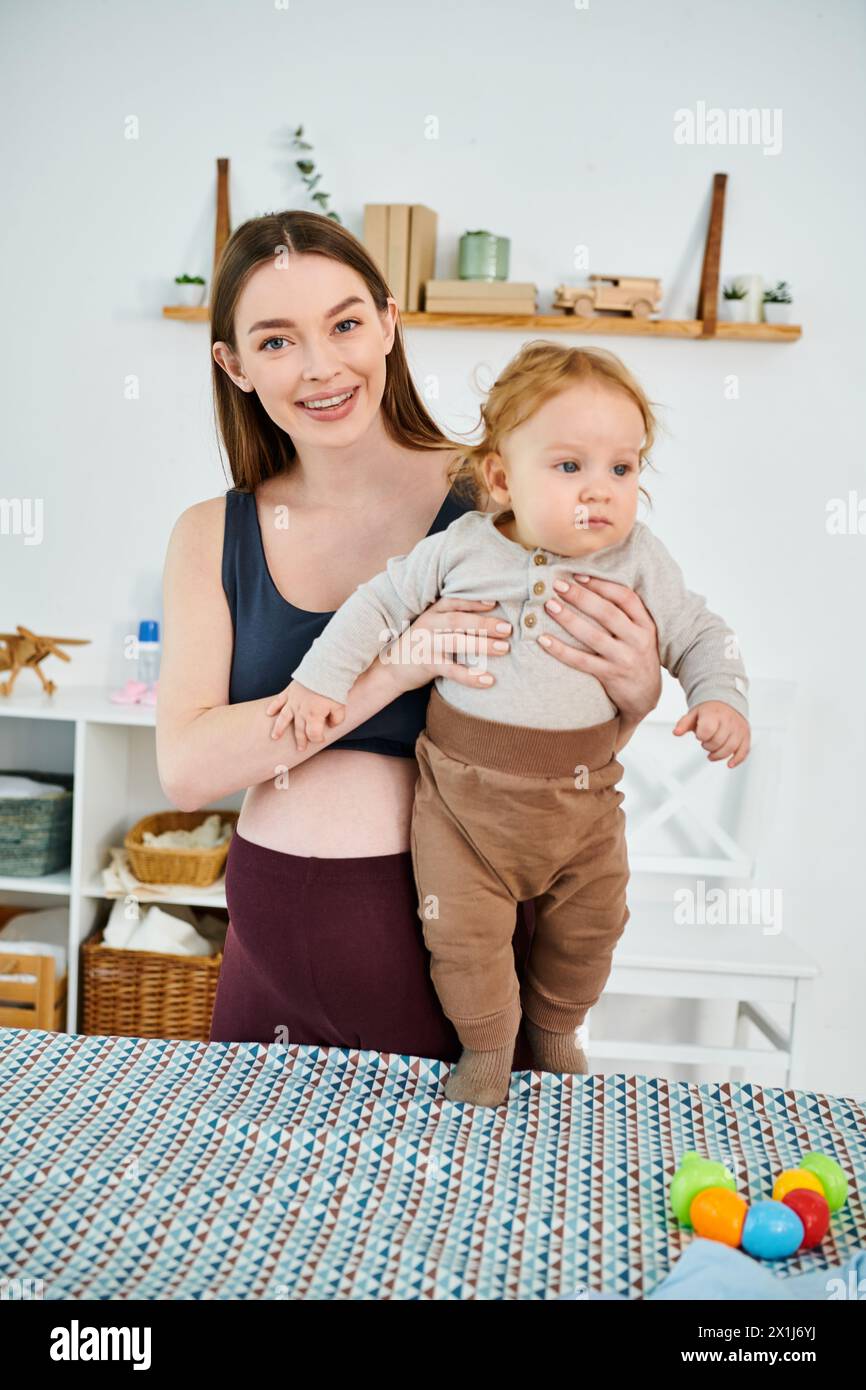 Woman cradles hi-res stock photography and images - Alamy