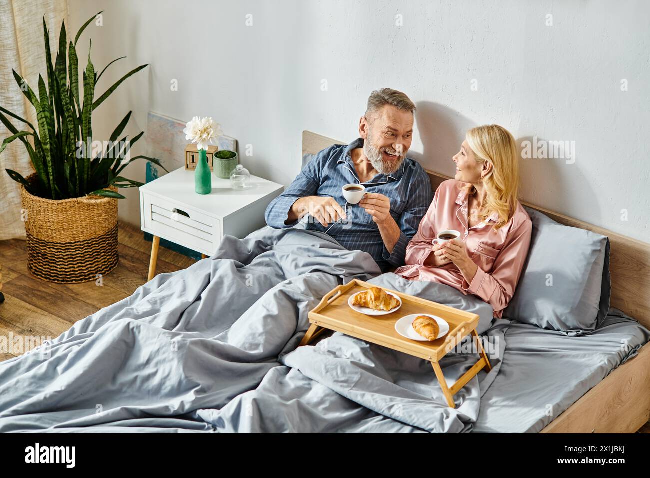 Mature couple bed romance hi-res stock photography and images - Alamy