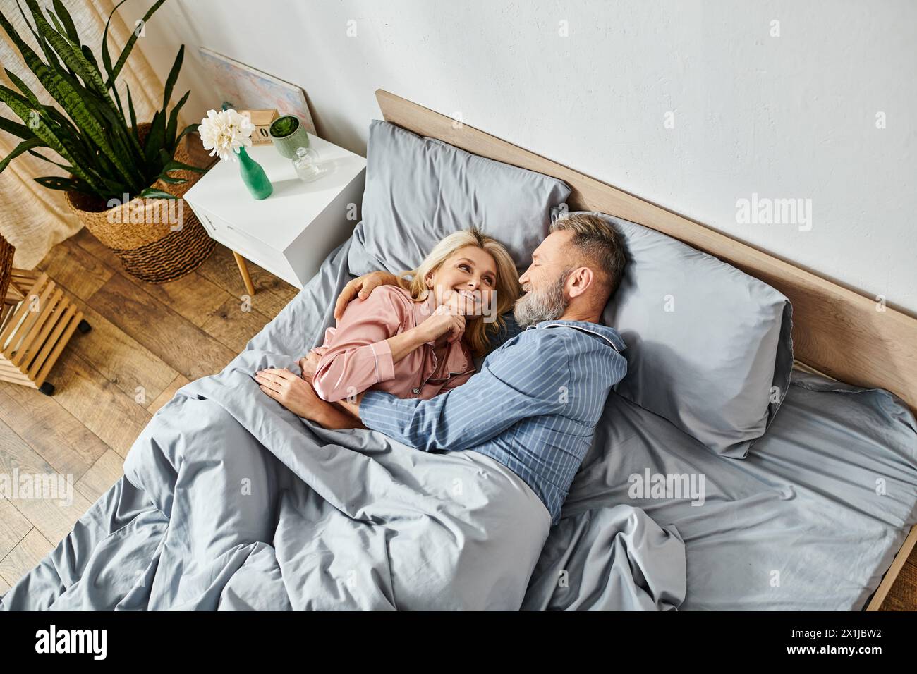 Couple mature bed bedroom love romance intimacy hi-res stock ...