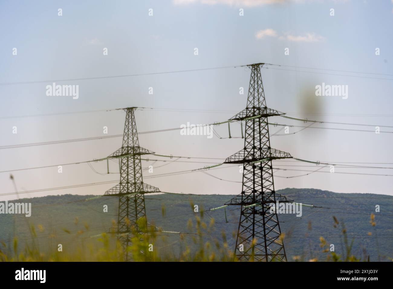 High voltage towers Electric pole. Power line support with wires for ...