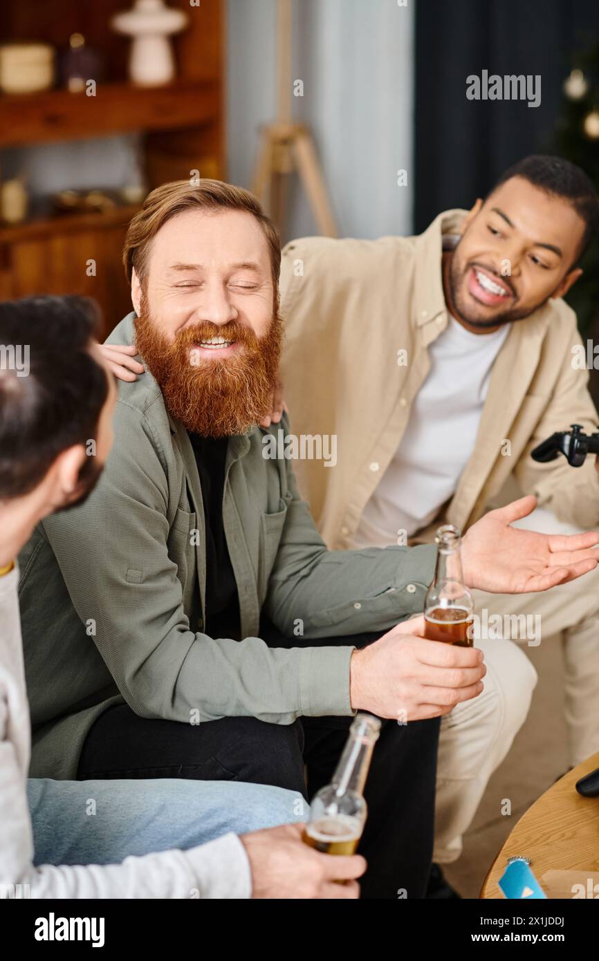Three cheerful, handsome men of different races enjoy drinks and ...