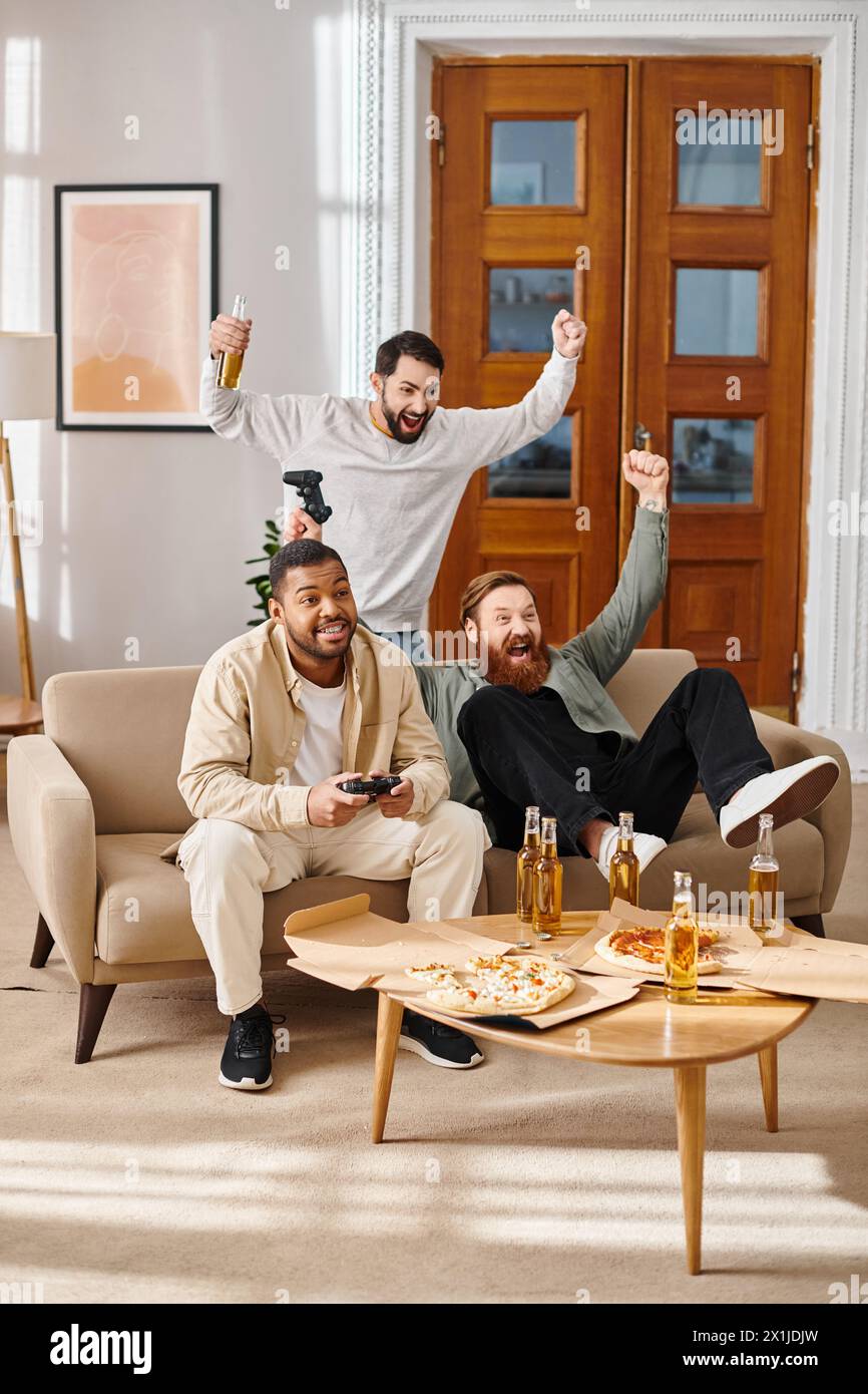 Three cheerful and handsome men of different races sitting on top of a ...