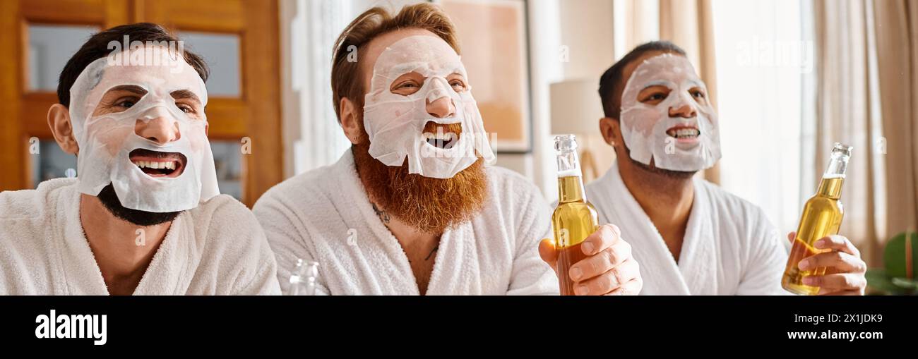 Three diverse, cheerful men in bathrobes, enjoying beers while wearing ...