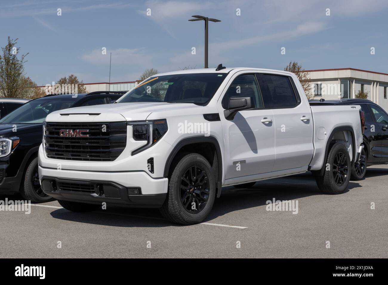 Carmel - April 14, 2024: GMC Sierra 1500 Elevation 3VL display at a dealership. GMC offers the ...