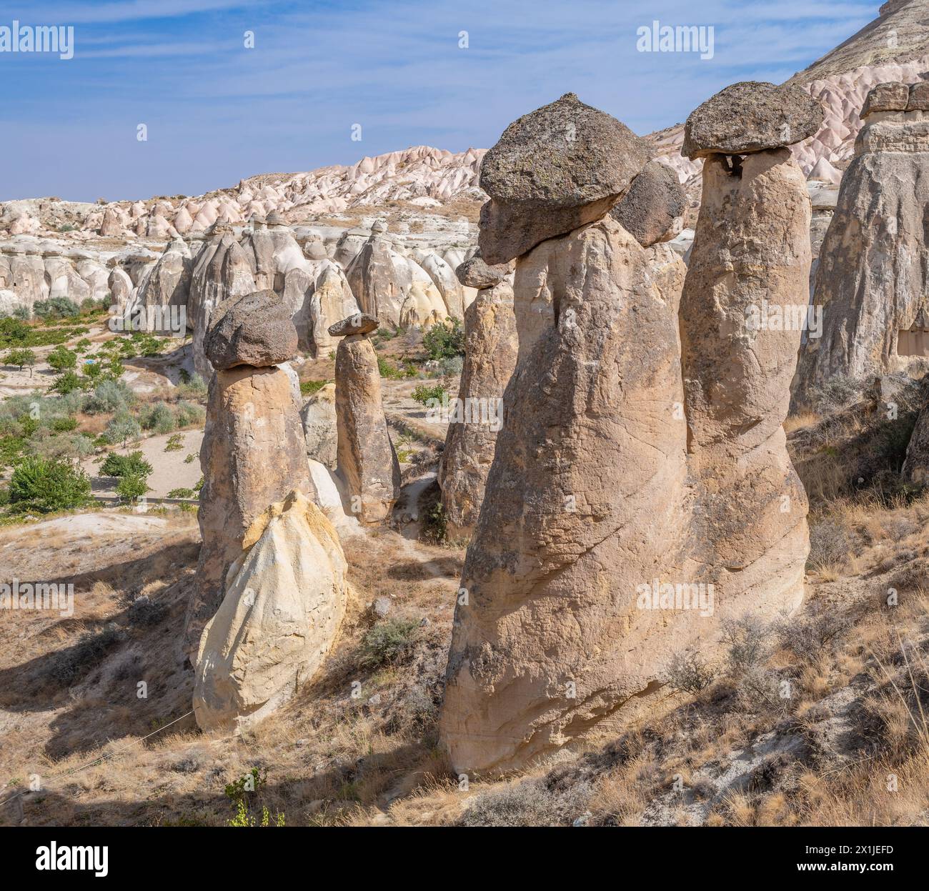 Fairy chimneys, unique rock formations near Cavusin Town in Cappadocia ...